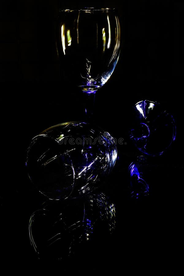 Crystal Glasses on a Glass Table and Their Reflection Stock Image ...