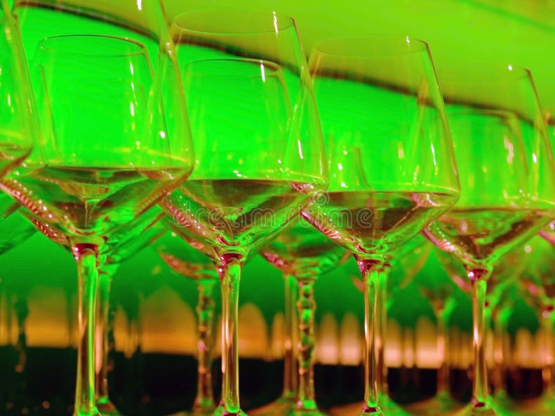 Crystal Glasses Lined Up in Illuminated Plexiglass Case Stock Image ...