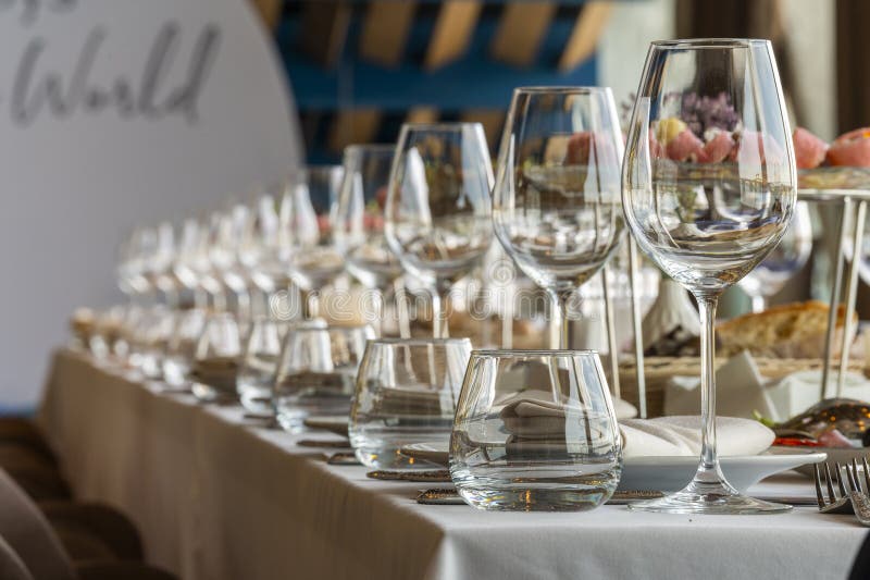 Crystal Glasses on a Table for Dinner Stock Photo - Image of setting ...
