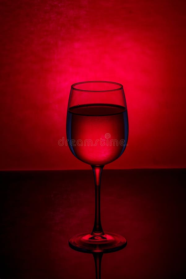 Crystal Goblet with a Drink with Reflection in Glass Stock Image ...