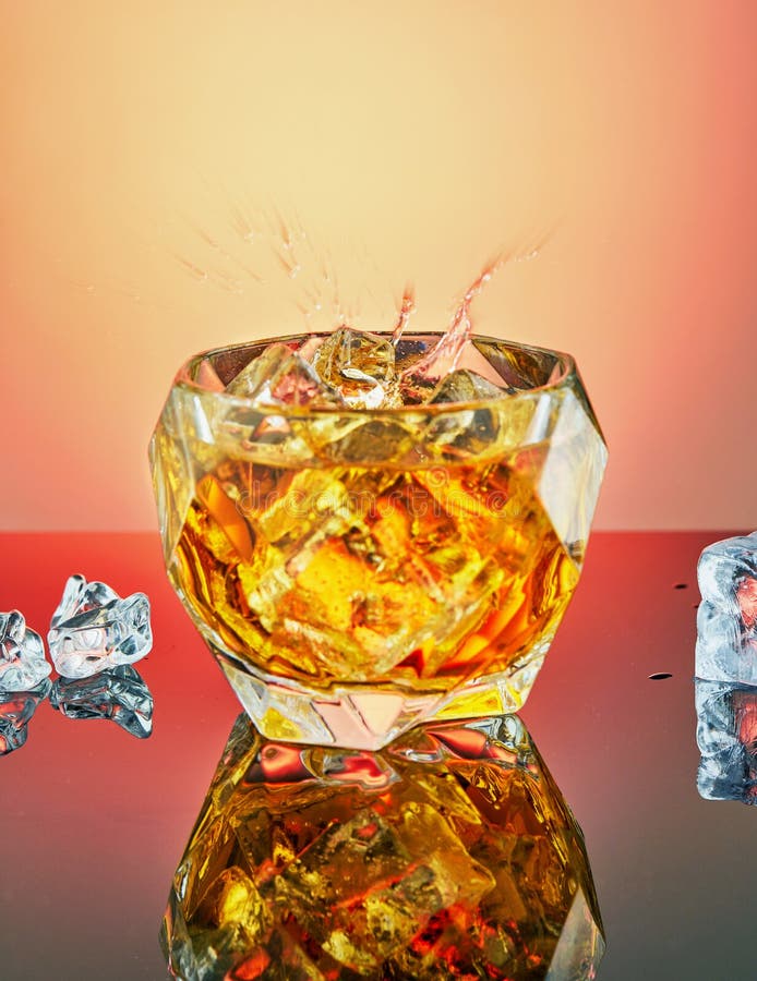 Crystal Goblet with a Splash of Luxury Whiskey and Ice Cubes Side View ...