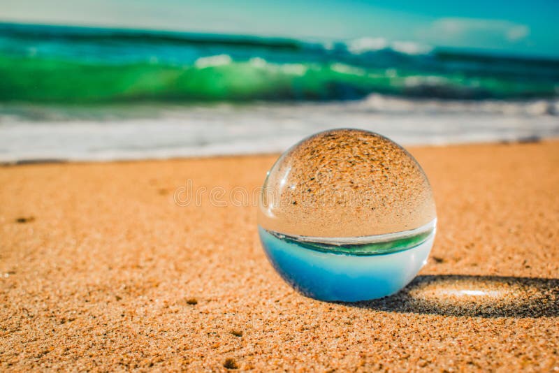 Crystal Lens Ball Creative Photography of a Sandy Beach Stock Image ...