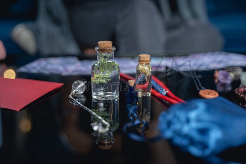 Crystal Pendulum and Small Bottles of Potion Stock Photo - Image of ...