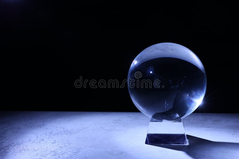 Crystal Prediction Ball on Table in Darkness, Space for Text. Fortune ...