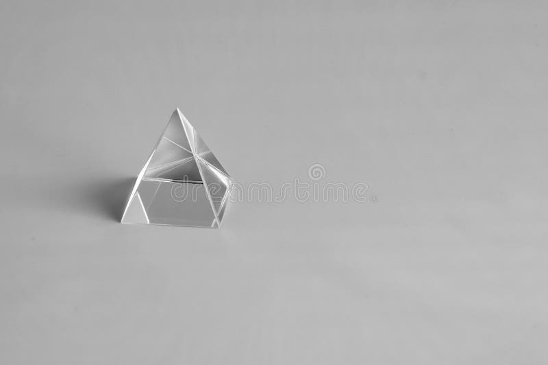 Crystal Pyramid on Gray Background. Sharp Edges. Mirrored Faces ...