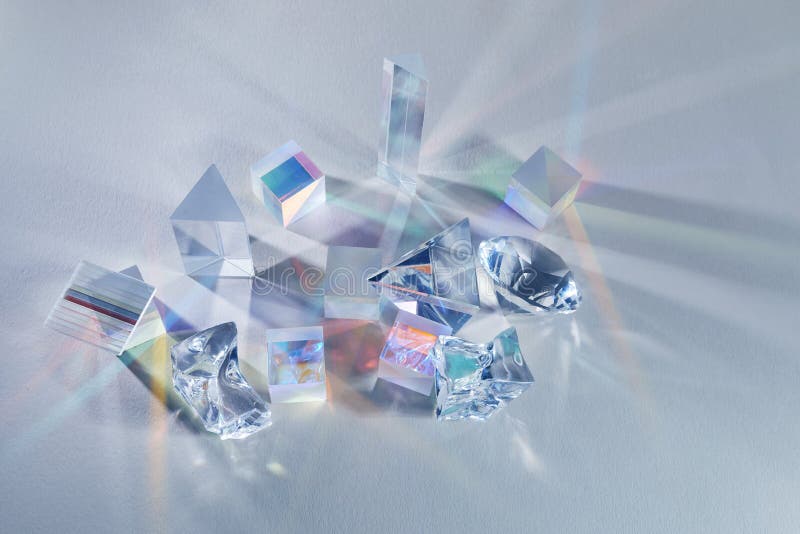 Crystal Refracting Light in Rainbow Colors on Cold Background. Stock ...