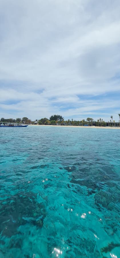 Crystal Sea Water and Blue Sky Stock Image - Image of wall, green ...