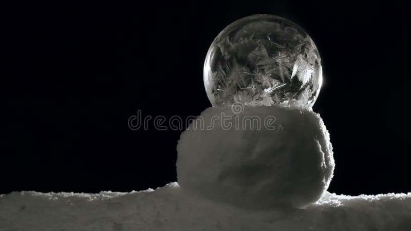 Crystal Snowman Freezing on Black Background Stock Footage - Video of ...