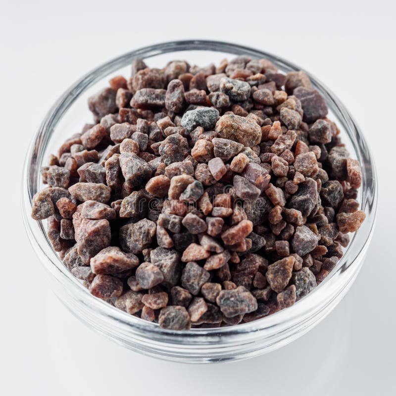 Crystalline Black Himalayan Salt on a White Background Stock Image ...