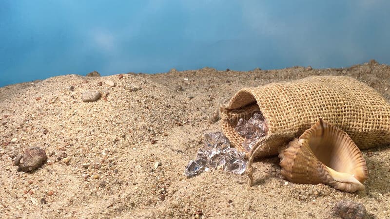 Jute sack on sand stock image. Image of pebbles, climate - 211934069