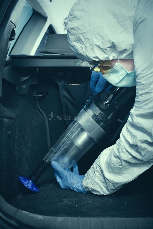 CSI - Technician Working with Special Micro Particles Filtering Vacuum ...