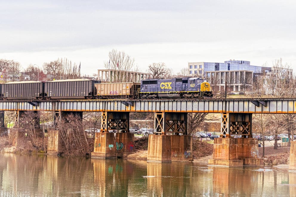 CSX Locomotive Engine Pulling a Coal and Freight Train on a Bridge ...