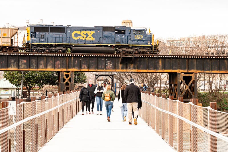 CSX Locomotive Engine Pulling a Coal and Freight Train on a Bridge ...