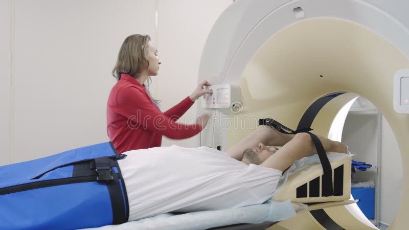 CT-scan Moving with Lying Man for Diagnostics Health Problem Stock ...
