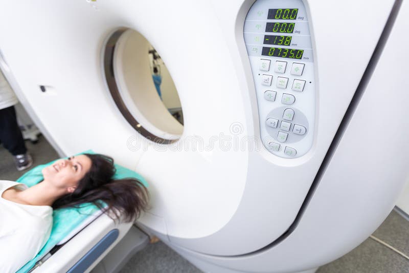CT Scan Technologist Overlooking Patient in Computed Tomography Scanner ...