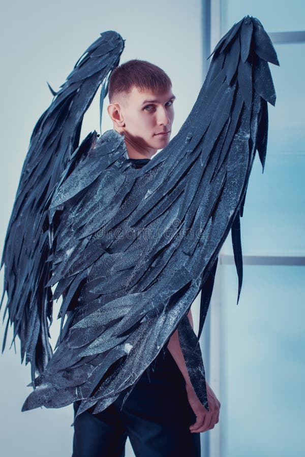 Cthe man with angel wings stock photo. Image of angels - 87649404