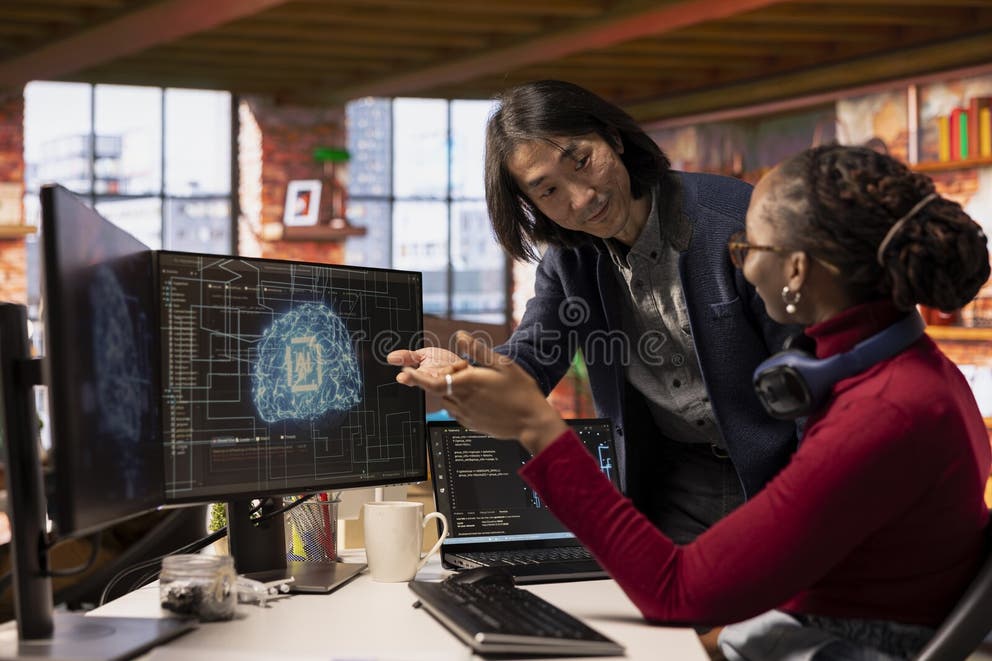 CTO Manager in Multiethnic Startup Office Helps Technician Coding Advanced AI Stock Photo ...