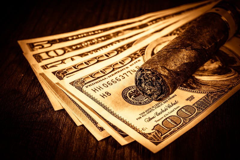 Cuban Cigar on a Several Dollar Bills Stock Photo - Image of foreground ...