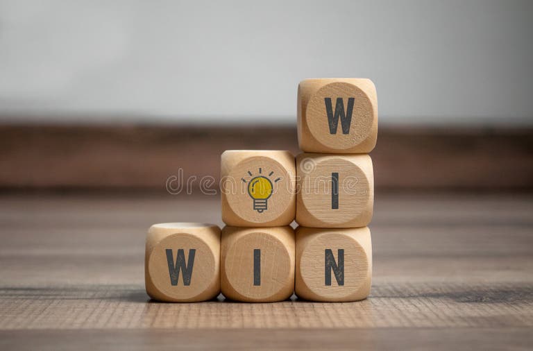Cube, Dice or Blocks with Message Win-win with Yellow Light Bulb on ...