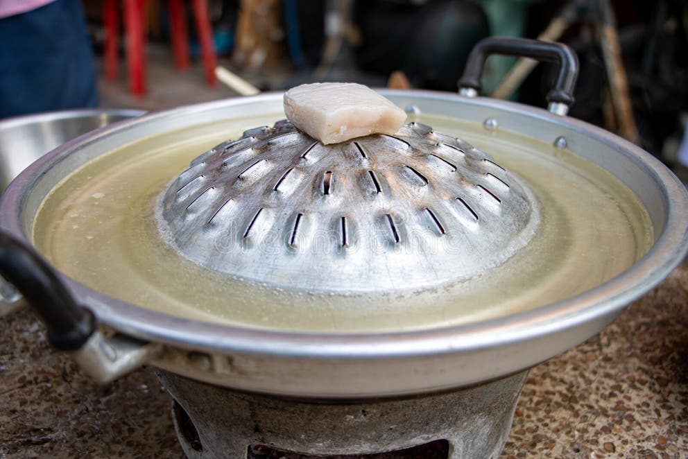 The Cube of the Fat is Dissolved in a Hot Pan Stock Photo - Image of ...