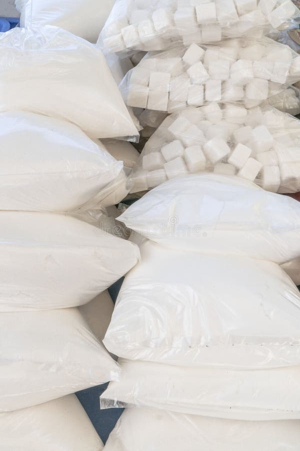 Cube and Granulated Sugar in Transparent Bags at Market Stock Image ...