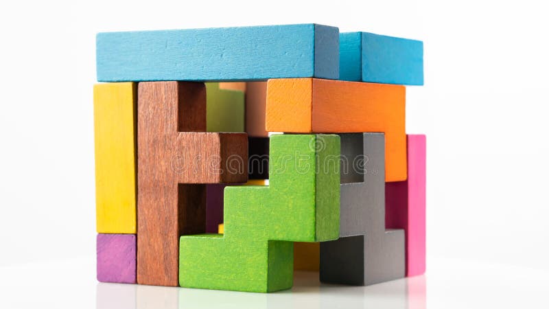 Cube Made of Multicolored Wooden Figures on a White Background. Stock ...