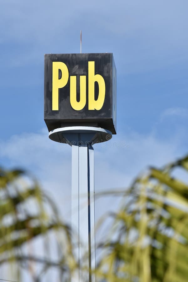 Cube-shaped pub sign stock photo. Image of letter, visibility - 74894122