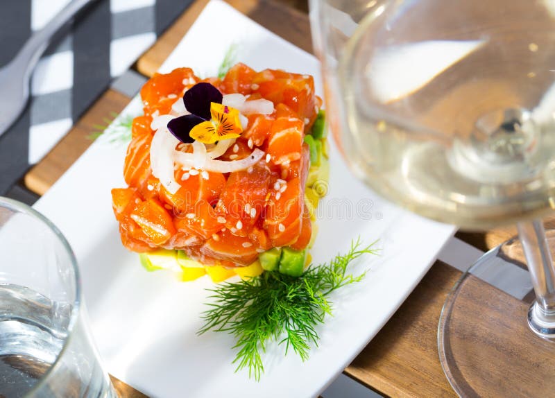 Cube of Tasty Tartar from Red Fish and Avocado Served on Plate Stock ...