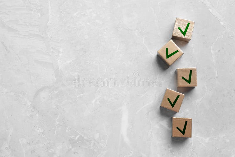 Cubes with Check Marks on Light Grey Table, Flat Lay. Space for Text ...