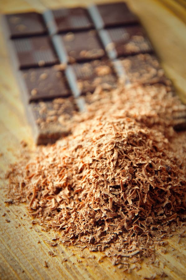 Cubes of Chocolate and Grated Chocolate Stock Image - Image of macro ...
