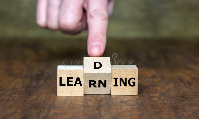 Cubes Form the Words Learning and Leading. Stock Image - Image of ...