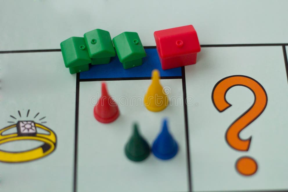 Cubes with the Game Monopoly on the Table Editorial Image - Image of ...