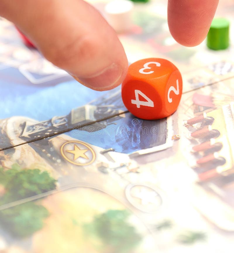 Cubes with the Game on the Table. Themed Board Games. Vertical View of ...