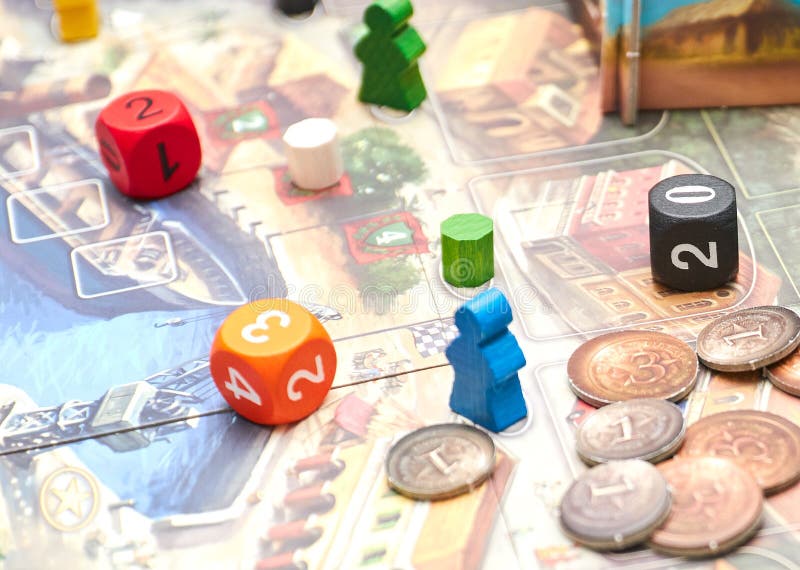 Cubes with the Game on the Table. Themed Board Games. Vertical View of ...