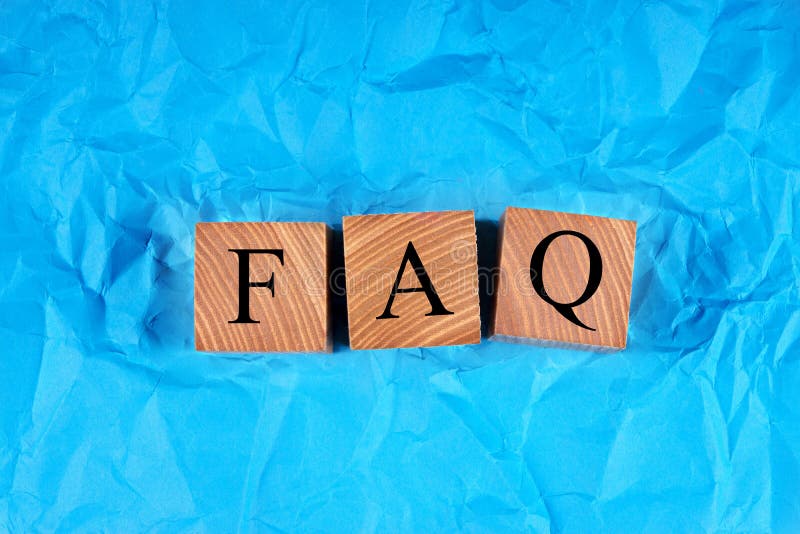 Cubes with an Inscription FAQ on Crumpled Blue Paper. Stock Photo ...