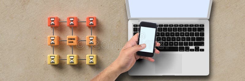 Cubes with Message COMING SOON and Hand with Smartphone and Computer ...