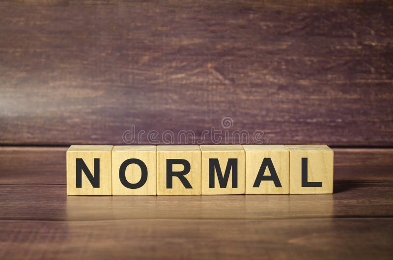 Cubes with Message NORMAL on Concrete Background Stock Image - Image of ...