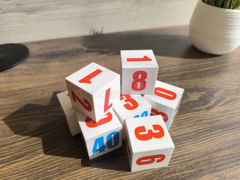 Cubes with Numbers on a Wooden Table Stock Photo - Image of december ...