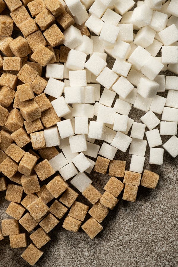 Cubes of Unrefined Brown Demerara Sugar and White Refined Beet Sugar. Stock Photo - Image of ...