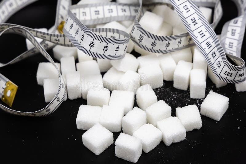 Cubes of White Refined Sugar on a Black Background Stock Photo - Image ...