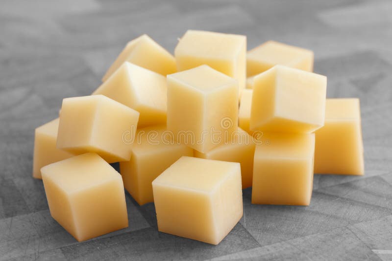A Close Up of Lots of Small Cheddar Cheese Pieces. Stock Image - Image ...