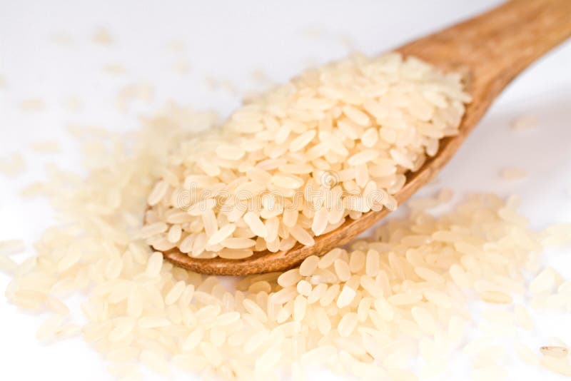 Cucchiaio Con Il Primo Piano Del Riso, Colpo Dello Studio Fotografia ...