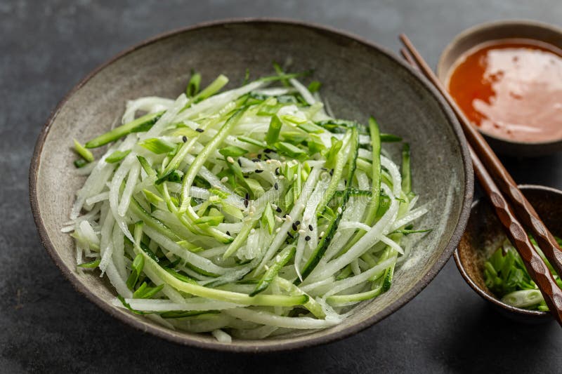 Cucumber and Daikon Radish Salad Stock Photo - Image of radish ...