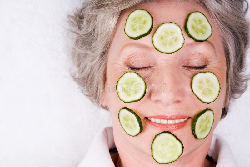 Beautiful Woman with Facial Mask of Cucumber Slices on Face Stock Photo ...