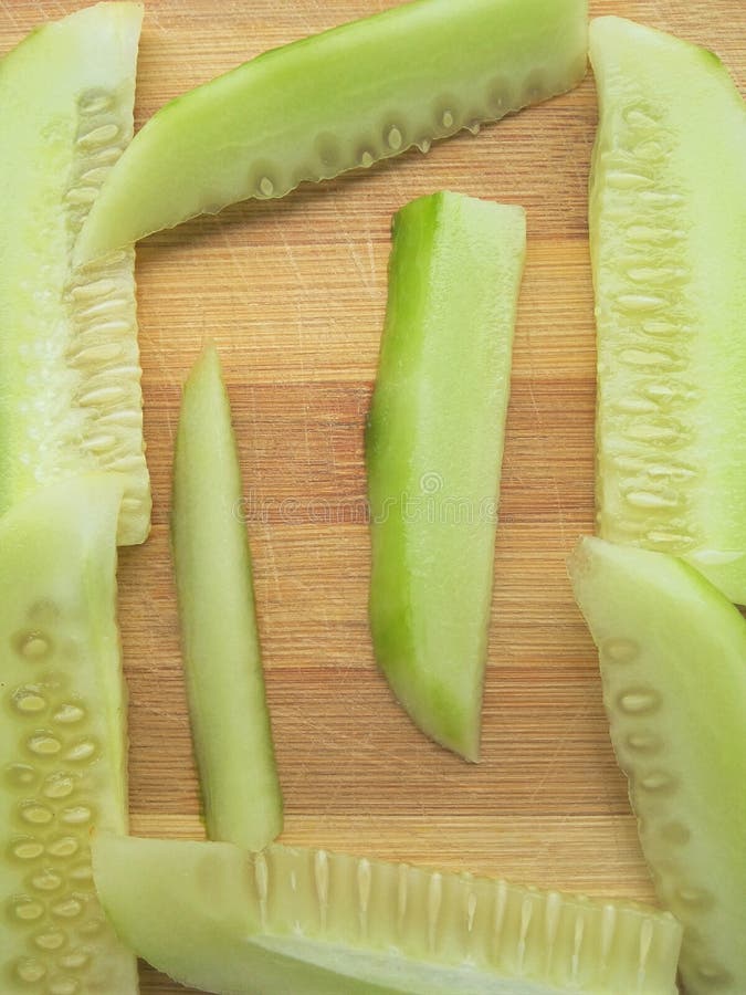 Cucumber pieces background stock photo. Image of freshness - 70009362