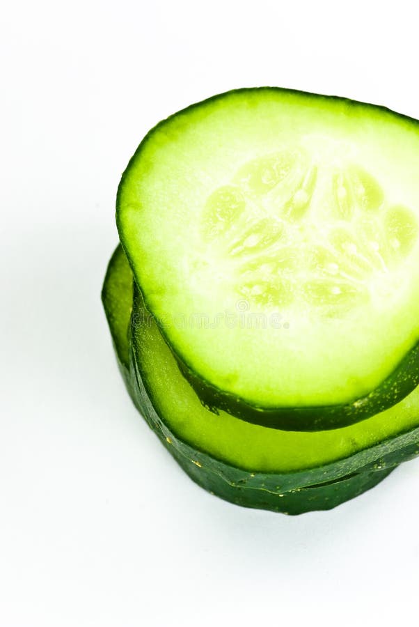 Freshly sliced cucumber stock photo. Image of produce - 2036730