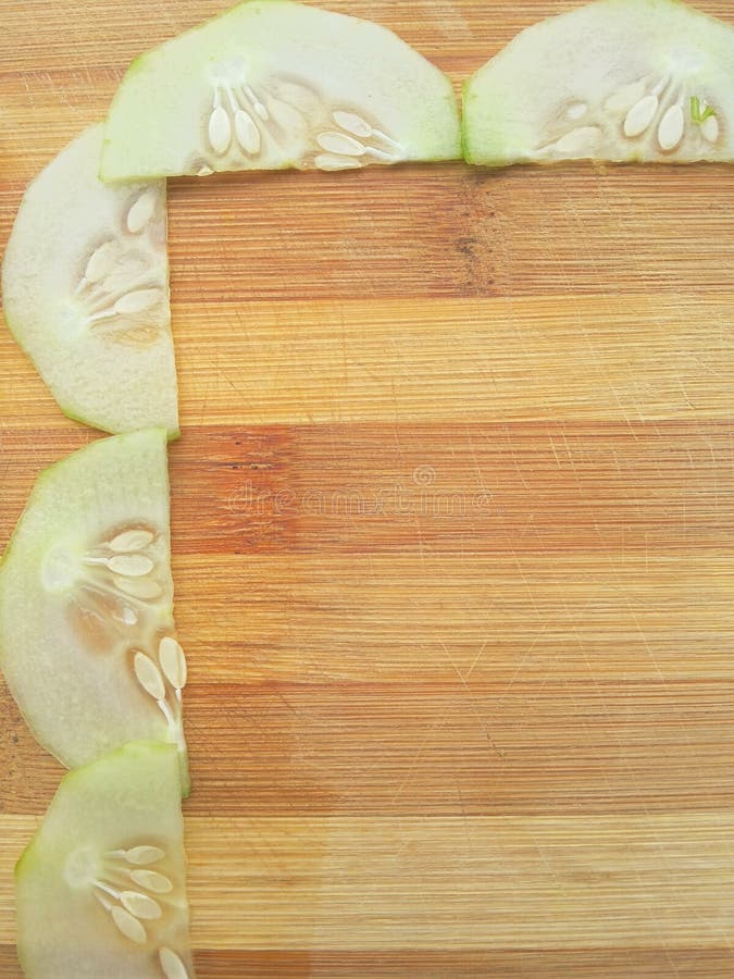 Cucumber slices border stock photo. Image of freshness - 70009084