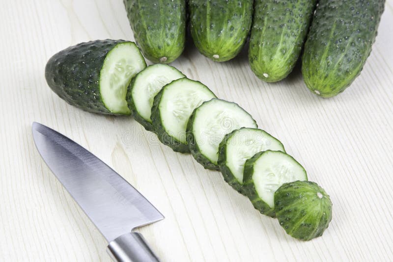 Cucumbers cut stock image. Image of knife, cucumber, pickles - 28763889