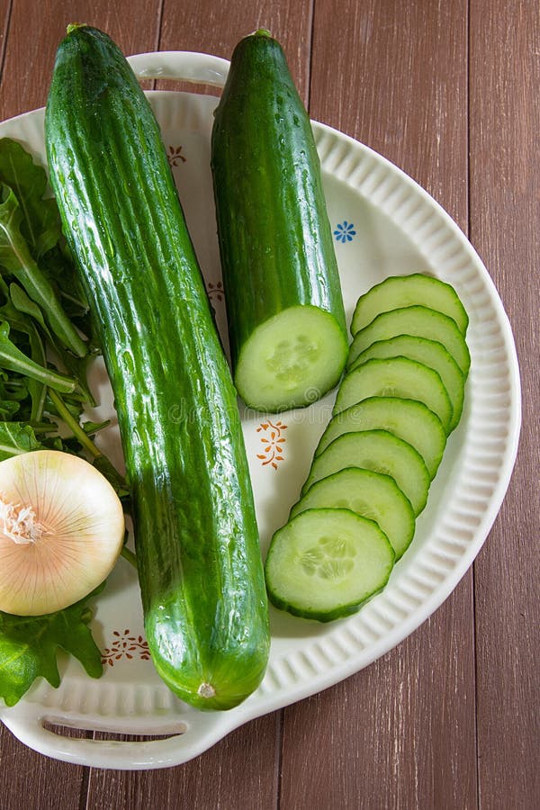 Cucumbers on a plate stock image. Image of vegetables - 60620807