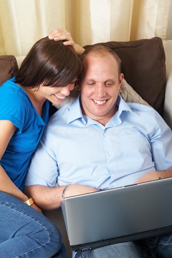 Cuddling with the laptop stock image. Image of laptop - 8146647